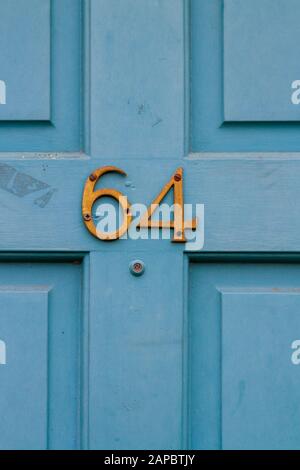 House number 64 Stock Photo - Alamy