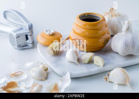 Close up of a garlic press Stock Photo - Alamy