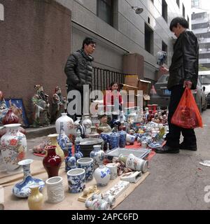 a street market in the City of Nanchang in the Province of Jiangxi in ...