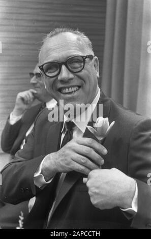 Arrival Jean Henri Weidner (resistance hero) at Schiphol, and wife ...