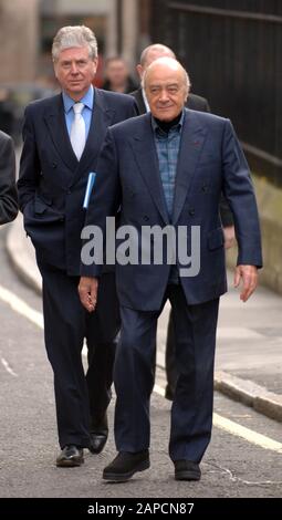 Mohamed Al Fayed and spokesperson Michael Cole arriving at the High ...