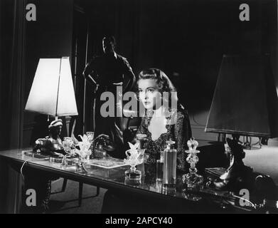 GARY COOPER as Howard Roark and PATRICIA NEAL as Dominique Francon in ...