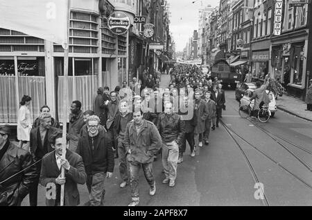 Construction workers demonstrate, the procession pulls through downtown ...