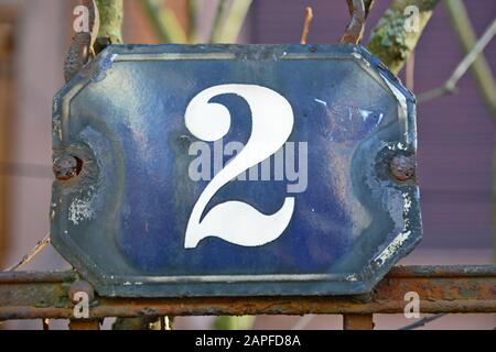 A house number plaque, showing the number two (2 Stock Photo - Alamy