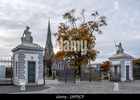 The old Freeport gate with guard houses topped by two zinc statues ...