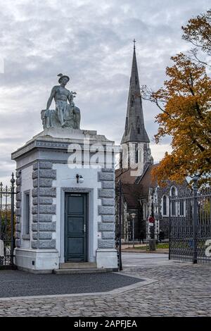 The old Freeport gate with guard house topped by two zinc statue ...