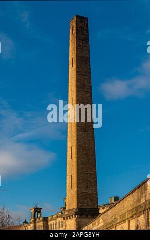 Salts Mill chimney (Listed Grade II) 68 metres high and built of hammer ...