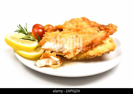 Baked tilapia fish fillet with spices Stock Photo - Alamy