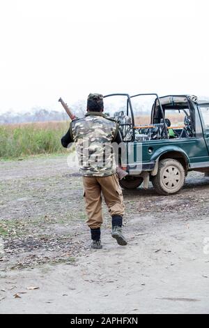 Kaziranga National Park: Park ranger on a lake, Assam, India Stock ...