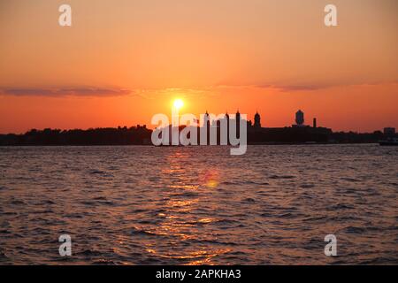 Summer sunset on Ellis Island Stock Photo - Alamy