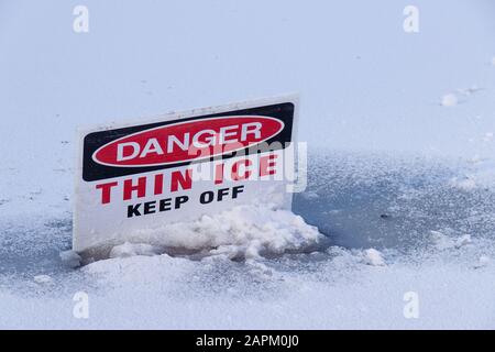 Danger Thin Ice Keep Off warning sign. Red River, Winnipeg, Manitoba ...