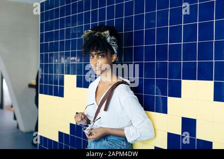 Photo of pretty millennial curly hairdo lady hold placard wear colorful ...