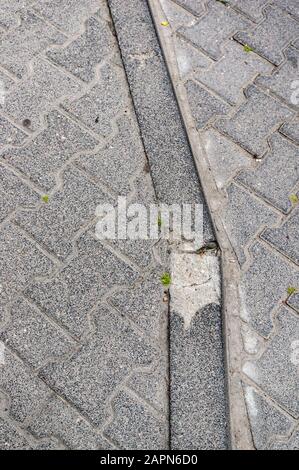 A closeup shot of the grey brick walkway Stock Photo - Alamy