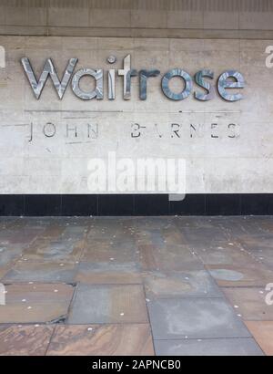 Signage outside a branch of the Waitrose supermarket chain at Tenterden ...