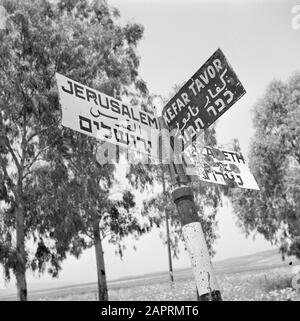 Israel 1948-1949: signpost Trilingual signpost with bullet holes ...