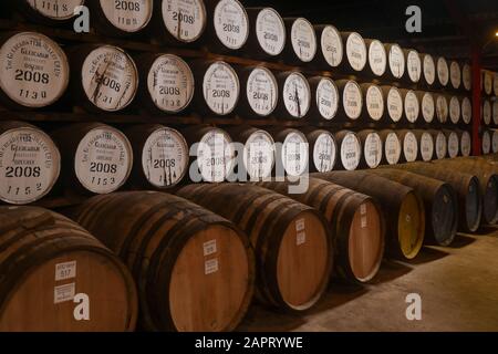 Whisky maturing in barrels stowed at Glencadam distillery which first ...