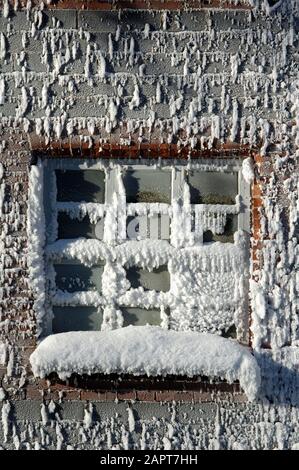 The window is covered with ice frost Stock Photo - Alamy