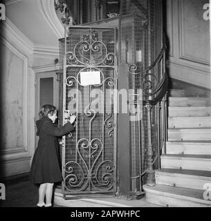 Stairwell and elevator in a residential building with a window on the ...