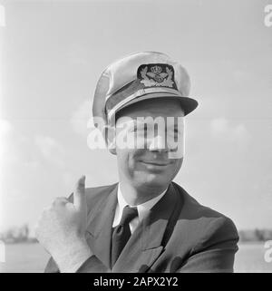 KLM staff corporate identity and Schiphol A KLM flight attendant poses ...