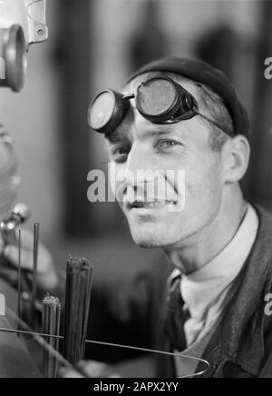 KLM staff corporate identity and Schiphol A KLM flight attendant poses ...