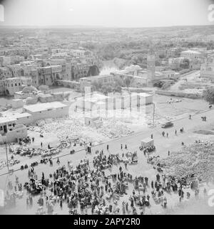 View of the cattle market of Hama from the tell in the background the ...