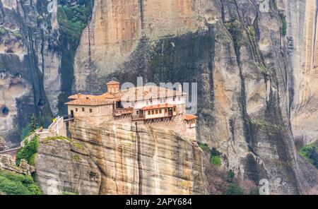 Amazing scenery with a monastery on top of a huge rock in Meteora ...