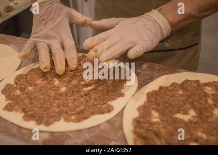 Pastry baking by arabian chef in Jordan Stock Photo - Alamy