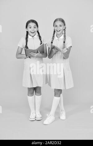 Sincere interest. School library. Educational books for school. Reading ...