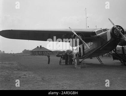 KLM Fokker Lark in Hull Mr. Geary with white cap of the KLM passenger ...