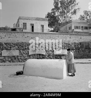 A supervisor at the grave of the philosopher and physician rabbi ...