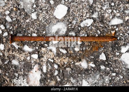 A rusty big and long nail Stock Photo - Alamy