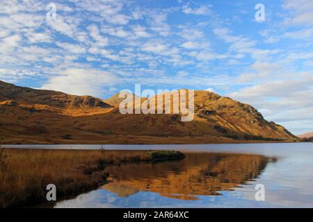 Reflection of autumn colours, Loch Eilt, Highlands, Scotland, United ...