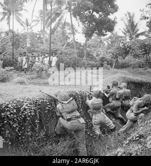 Dutch Army, KNIL (KN.I.L.). Group photo in the garden of residents of ...