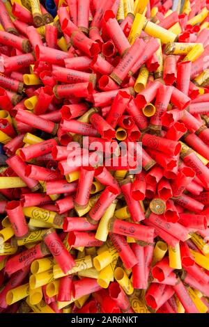 Empty fired plastic shotgun cartridges that have been collected for ...