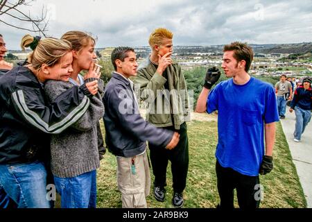 Female high school students smoking a cigarette Stock Photo - Alamy