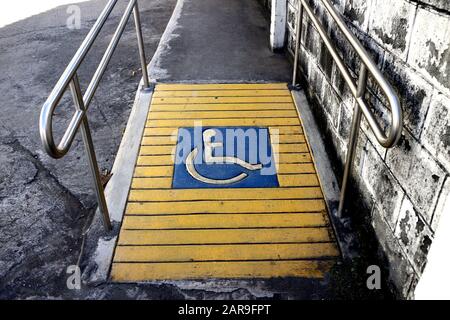 Photo of a PWD or Person with Disability ramp on a sidewalk Stock Photo ...