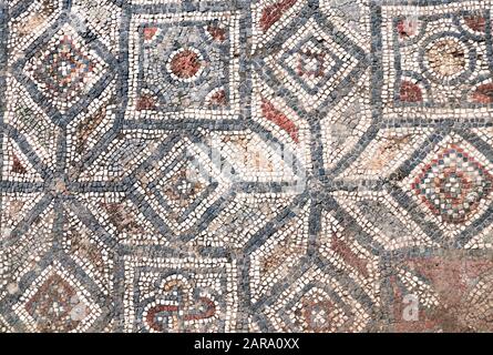 Colorful ancient roman marble floor, weathered and broken, heritage of ...