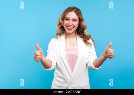 Portrait of attractive lucky cheerful wavy-haired girl great news ...