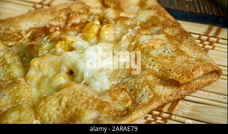 Zanzibar pizza, crispy pancakes with as many meats, sweets, or ...