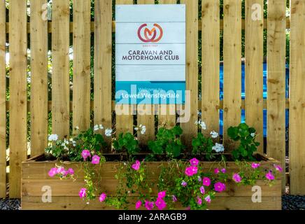 The entrance and sign at the Caravan & Motorhome Club site near ...