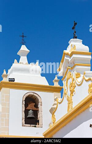 Tower of Igreja Matriz de Alvor - church in a portuguese city. White ...