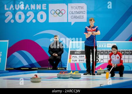 Team GB’s Jamie Rankin (15) competes in the curling mixed doubles with ...