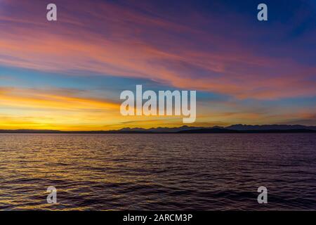 Many colors fill the sky as the sun set over the Puget Sound Stock ...
