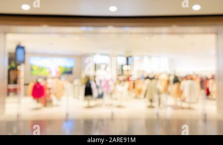 blur clothing store background in shopping mall Stock Photo - Alamy