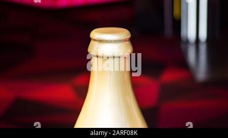 Golden Bottleneck of a champagne. Bottle on gradient grey background ...