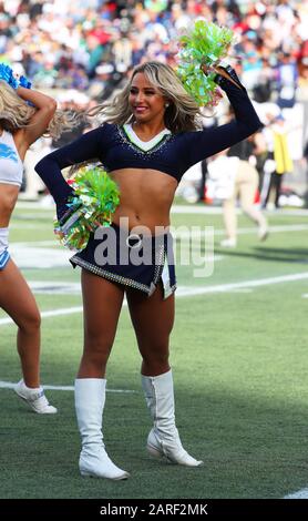 A Seattle Seahawks cheerleader performs during the flag football event ...