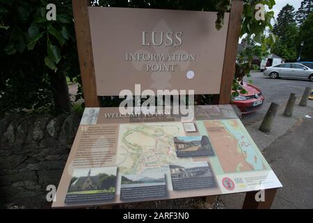 Luss Scotland Welcome sign board brown road sign outside street art ...