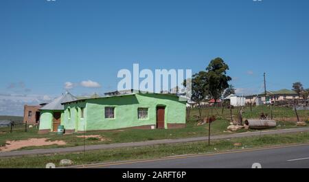 Colourful painted Zulu mud hut / rondavel / kraal in rural Kwazulu ...