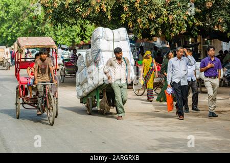 Goods and big loads get transported by human power on carts and cycle ...