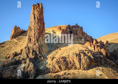 Rock formations of volcanic rhyolite ash-flow tuff showing differential ...